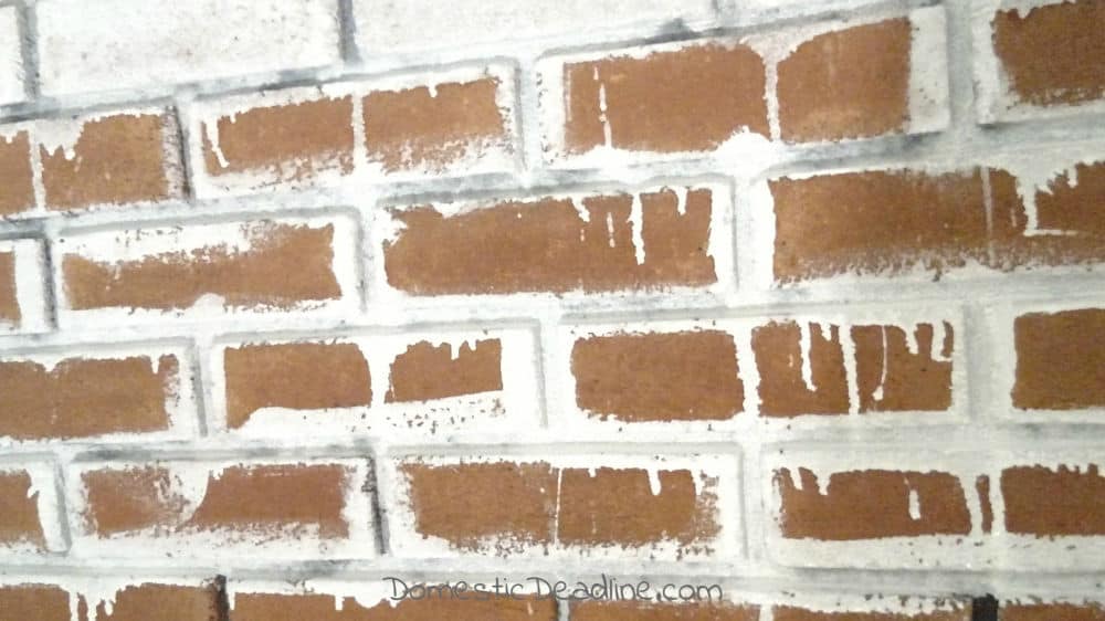 Farmhouse Inspired Whitewash Brick Fireplace Wall