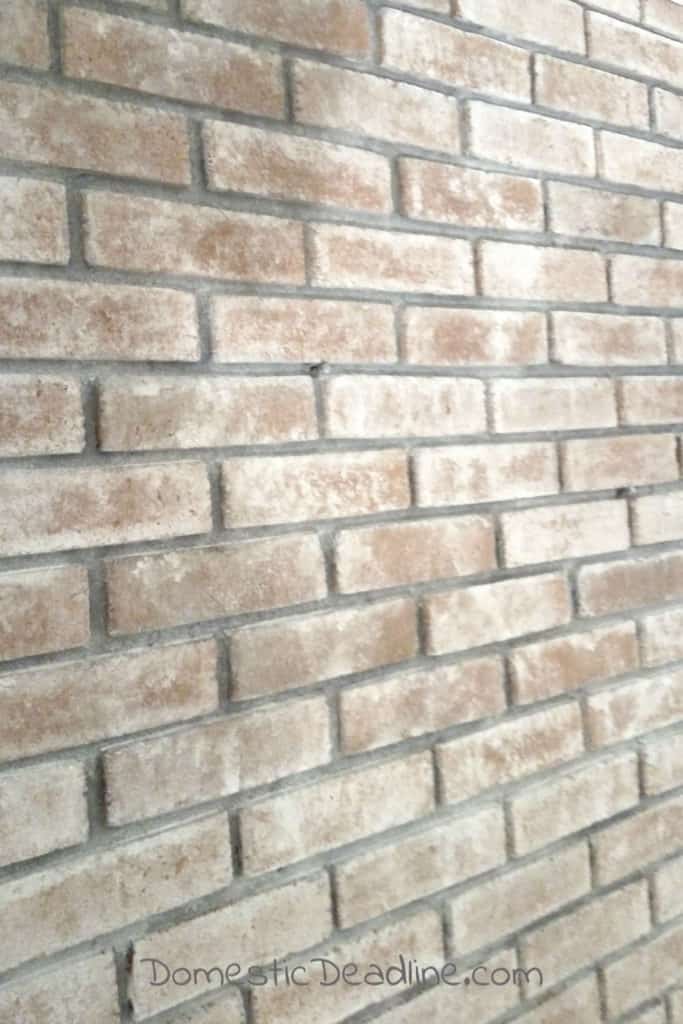 Farmhouse Inspired Whitewash Brick Fireplace Wall